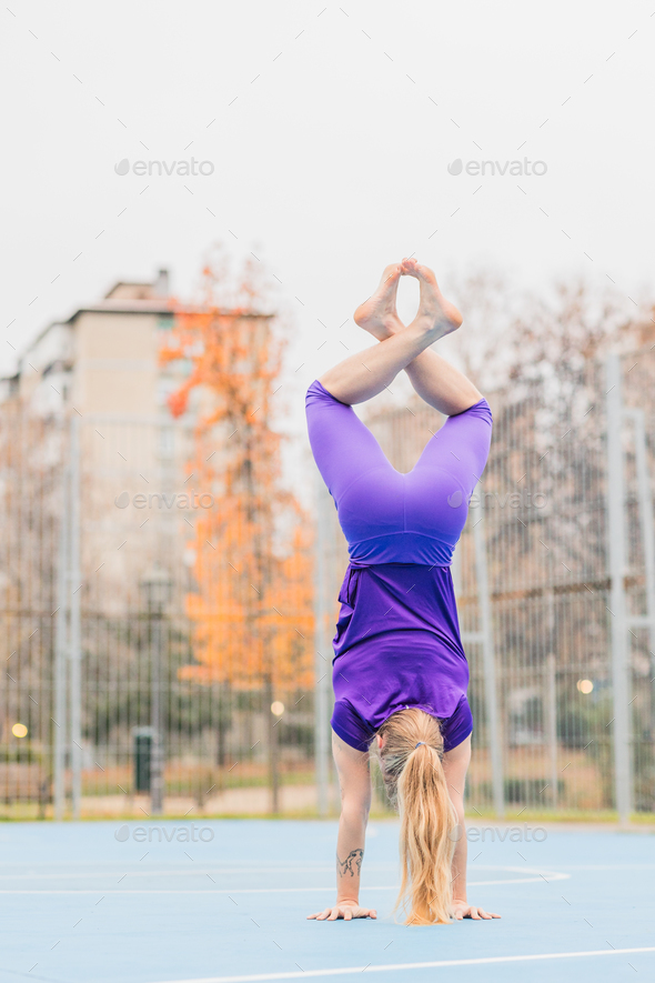 Sport fitness handstand exercise for calisthenics balance. Hispanic mid ...