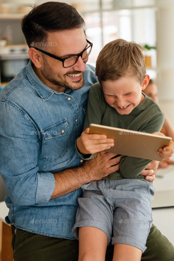 Distance learning, online education, home work concept. Family with ...