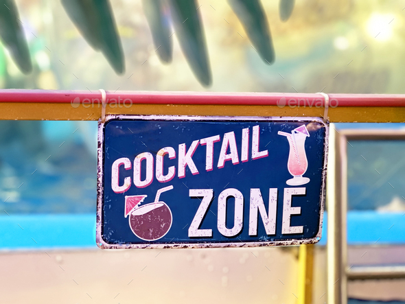 Bright Blue Rustic Flag Arrow Sign "Cocktail Zone" in Front of Palm ...