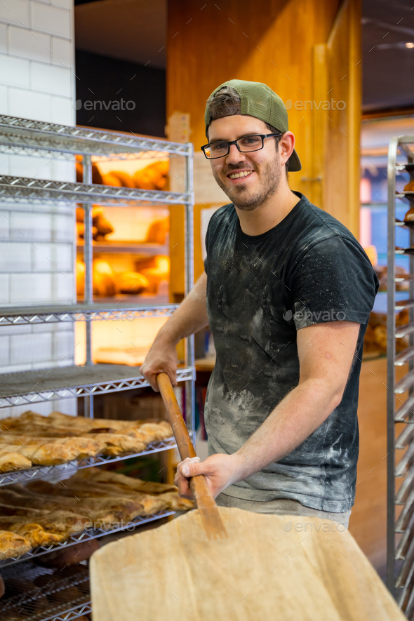 Portrait of baker of bakery in the workshop workshop of artisan bakery ...