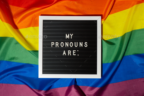 MY PRONOUNS ARE text Neo pronouns concept on Rainbow flag background ...