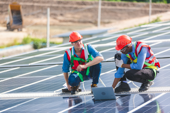Professional engineer team installing solar photovoltaic panel system ...