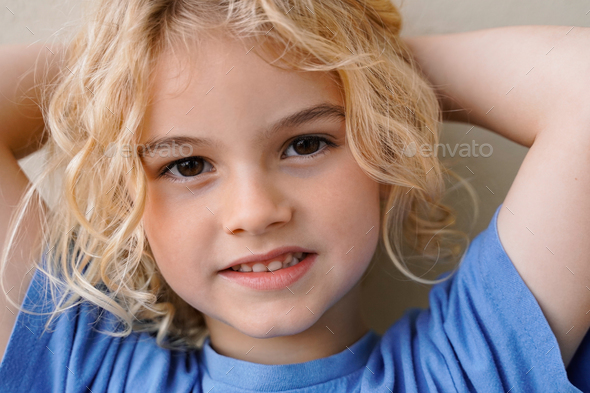 Authentic shot of child kid smiling on camera - Real people portrait ...