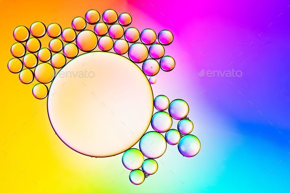 Vibrant and captivating still of multi-colored bubbles of varying sizes ...