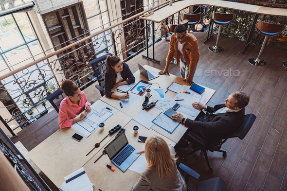 Executive team business people listening ceo negotiating discussing ...