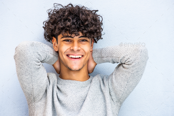 Close up portrait happy young North African man smiling laughing with ...