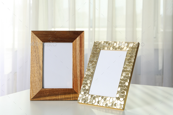 Photo frame on the table, with empty space Stock Photo by AtlasComposer