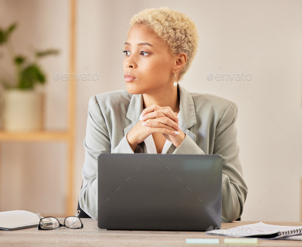 Thinking, serious and a woman with a laptop in an office for ideas ...