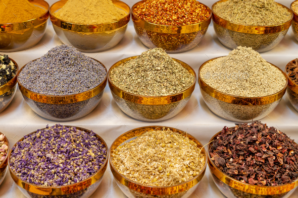 Variety of Arabic spices and herbs in the traditional spice market in ...
