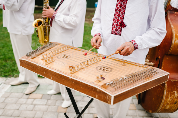 Close-up a dulcimer which Thai traditional music instrument. Man ...