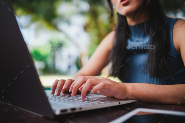 University student typing on a laptop Stock Photo by pablorasero ...