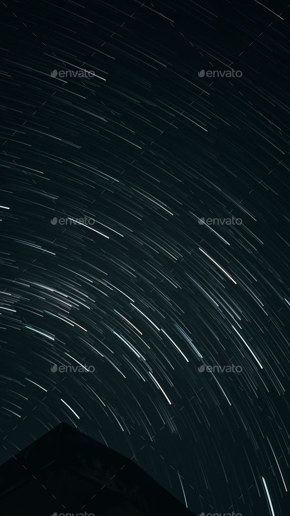Breathtaking night sky displaying an array of stars streaking across a ...
