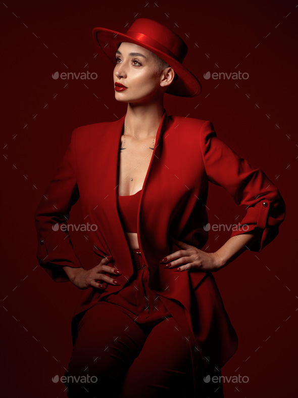 Vision, fashion and a woman thinking on a red studio background for ...