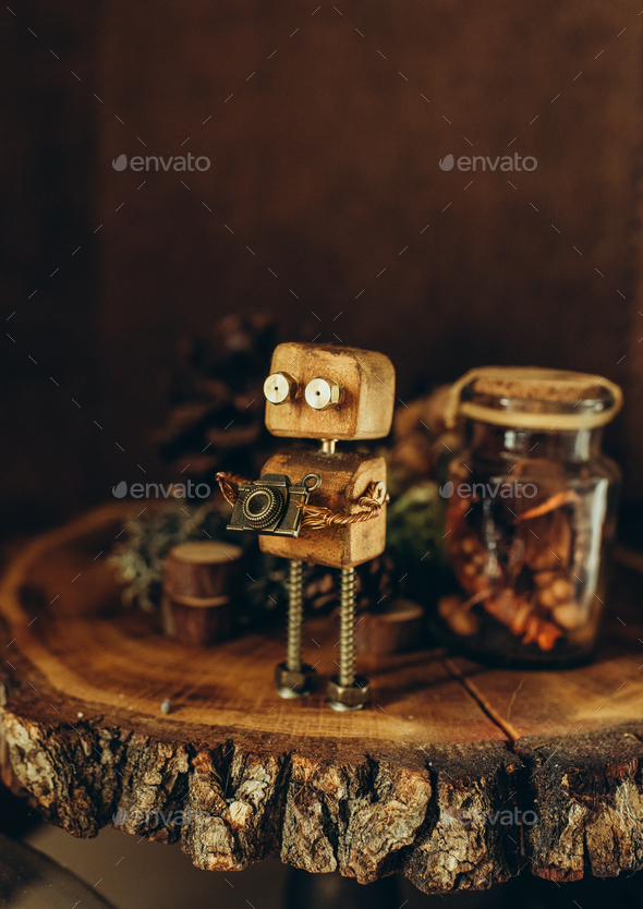 Cute family of robots made by hand from scrap materials, wooden robot ...