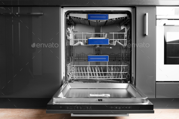 Built-in dishwasher in the kitchen front view. Stock Photo by DS-Studio-N