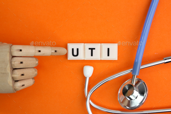 the letter of the alphabet UTI or the word abbreviation Urinary Tract ...