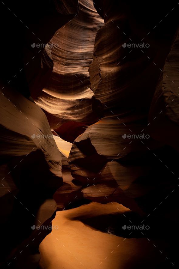 Spectacular desert landscape featuring Antelope Canyon illuminated by a ...