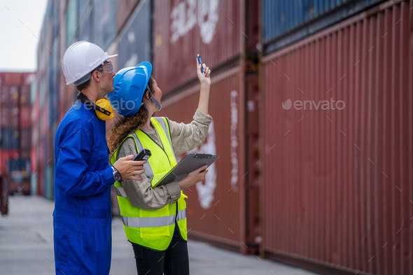 Engineer container cargo with worker working and checking stock into ...