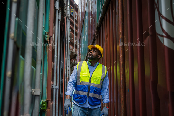 Container operator inspection containers box from cargo ship for export ...