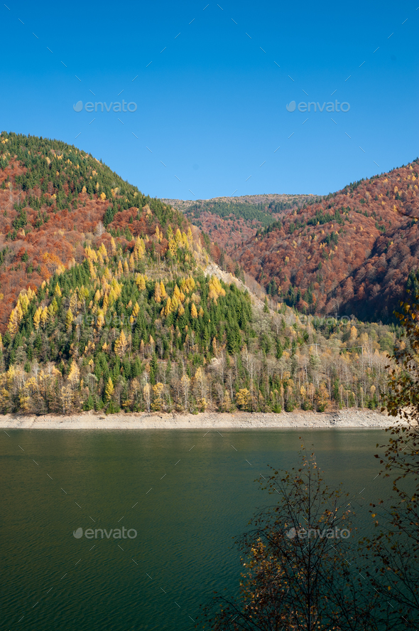 Picturesque mountain range and the Rausor dam in the Arges county ...