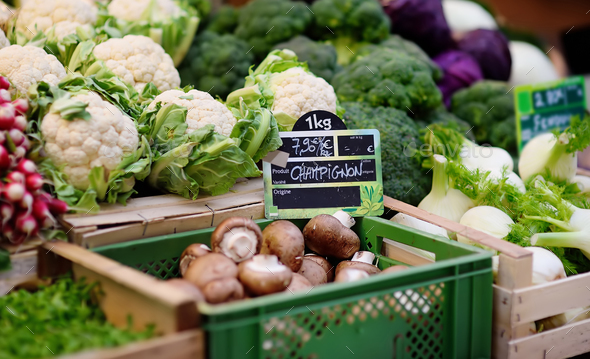 Fresh bio mushrooms and various vegetables on farmer market in ...