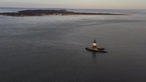 an aerial view of Long Island Sound with a lighthouse off the east end ...