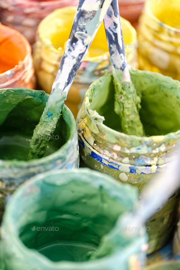 Large group of open cans of multi-colored paints Stock Photo by ...