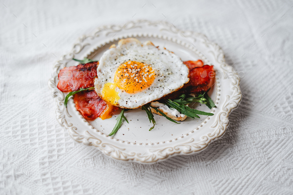 bacon fried egg toast on white background Stock Photo by ArtRachen