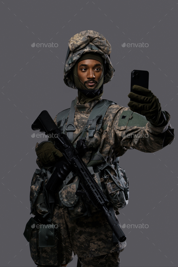 Dark skinned soldier in military uniform Stock Photo by fxquadro ...
