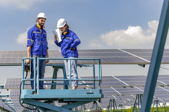 Electrical engineers are examining the working conditions of many solar ...