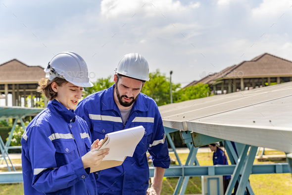 Electrical engineers are examining the working conditions of many solar ...