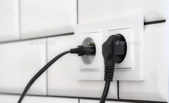 Electrical plug in socket Stock Photo by AFGreen | PhotoDune