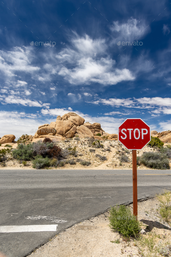 Cross roads and a stop sign Stock Photo by karandaev | PhotoDune