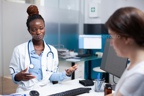 Doctor - patient check-up consultation Stock Photo by DC_Studio | PhotoDune