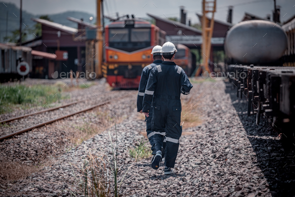Engineer railway under inspection and checking construction railway ...