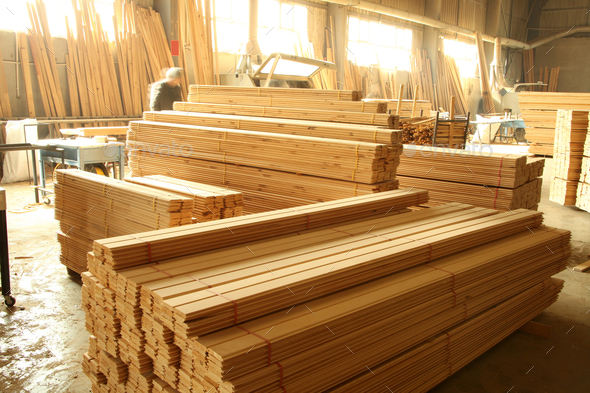 Wood timber construction material. Pile of construction timber at the ...