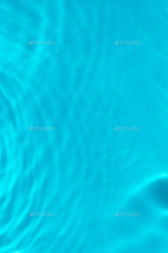 Defocused water background. Bright blue liquid ripple circle sea ...