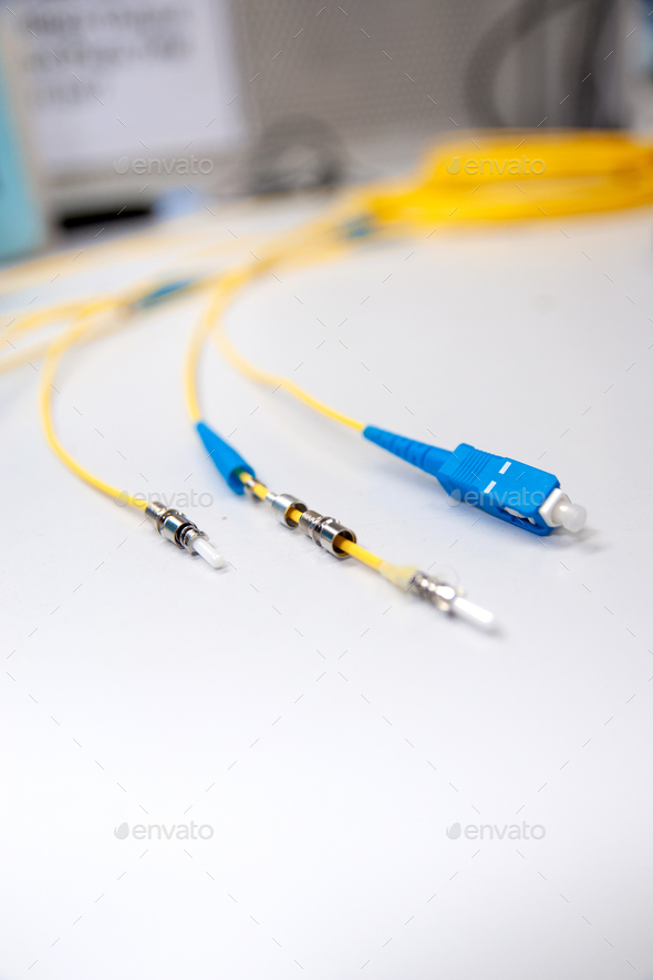 Fiber optic SC connector on white background Stock Photo by eelinstudio