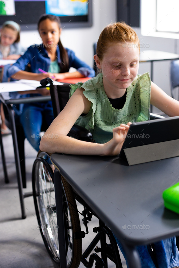 Child In Wheelchair In Classroom
