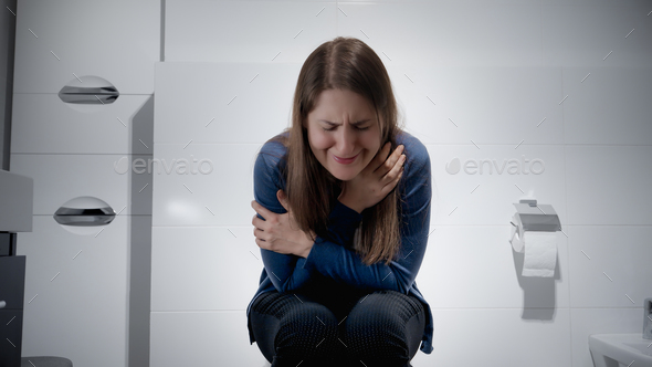 Sad woman crying in toilet and feeling lonely. Concept of depression ...