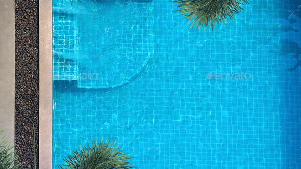 Top view images of swimming pool in summer season Stock Photo by gnepphoto