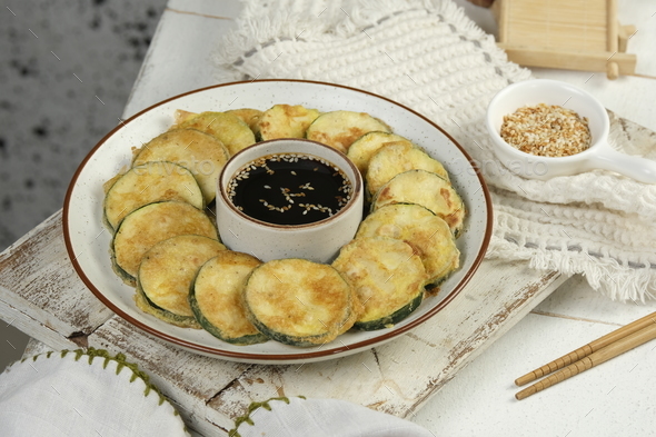 Hobak Jeon, pan fried zucchini with dipping sauce Stock Photo by edgunn36