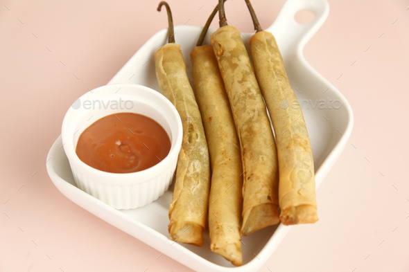 Freshly cooked Filipino food called Dynamite Stock Photo by junpinzon