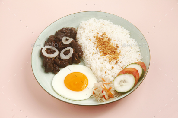Photo of freshly cooked Filipino food called TapSilog or beef tenders ...
