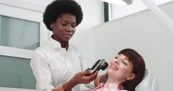 The Doctor Is African American Dermatologist Examines A Skin, Stock Footage