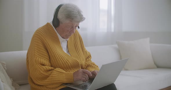 Senior Mature Older Woman Typing a Message on the Keyboard, Online ...