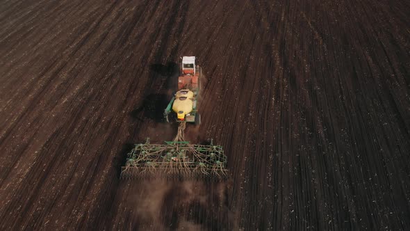 Planting Seeds in Dust Ground. Spring Agricultural Work. Aerial Top ...