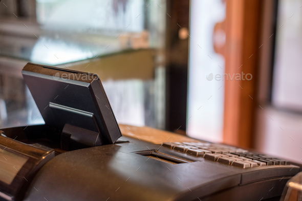 Empty cash register on counter Stock Photo by Mumemories | PhotoDune