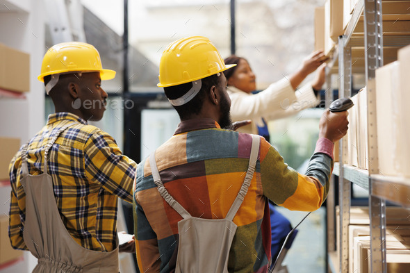 Shipment department workers using barcode scanner in warehouse Stock ...