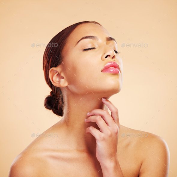 Face, relax or woman with natural beauty in studio isolated on brown ...